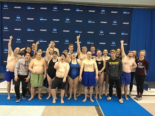 Jake Burris works with Special Olympians before NCAA swim and dive ...